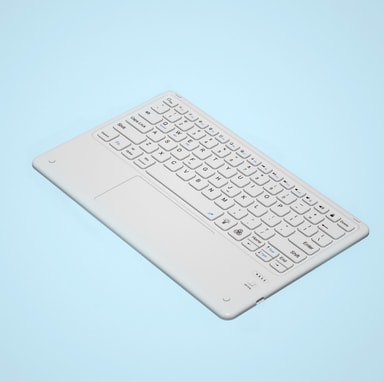 Mini trådlöst Bluetooth-tangentbord med pekyta Vit - Elgiganten